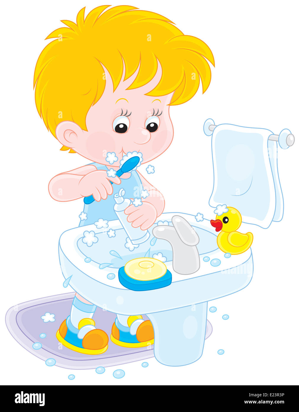 Little boy cleaning his teeth in a bathroom Stock Photo - Alamy