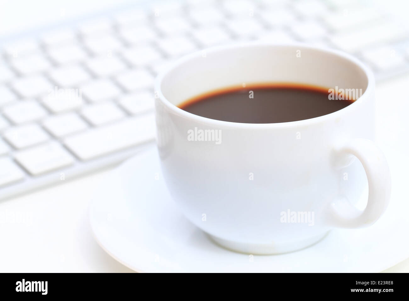 Computer keyboard and coffee cup hi-res stock photography and images ...