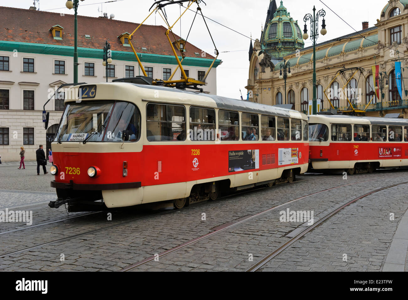 A traditional red tram on the tramway in Prague (Praha), Czech Republic ...