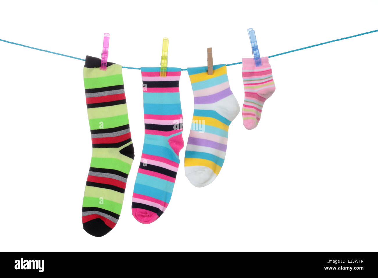 colorful striped socks hanging on a white background Stock Photo - Alamy