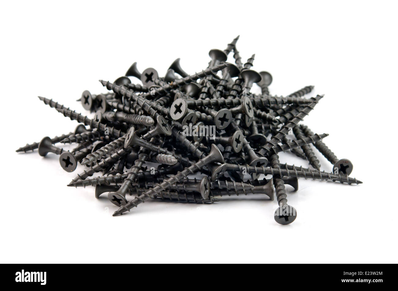 Black drywall screws isolated on white Stock Photo - Alamy