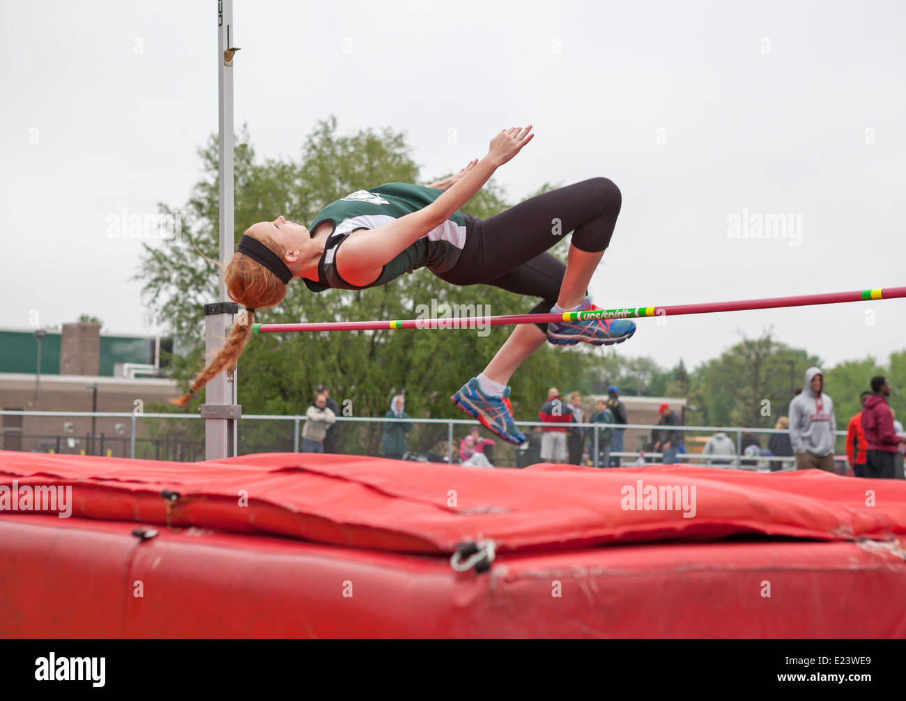 High school athletes compete in a track and filed meet in Milwaukee ...