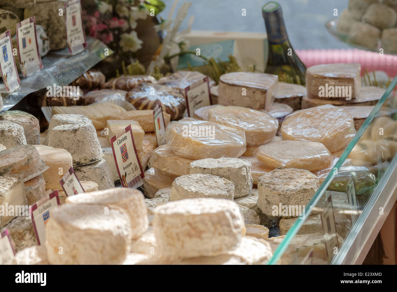 The food market at rue Mouffetard in Paris, France showing cheeses in a ...