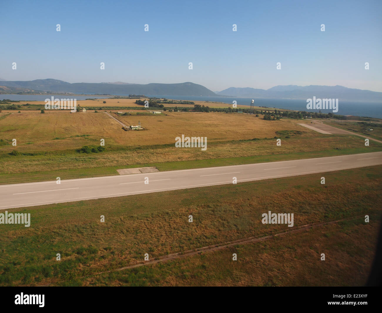An aircraft takes off from runway 25R at Aktion National Airport. The ...