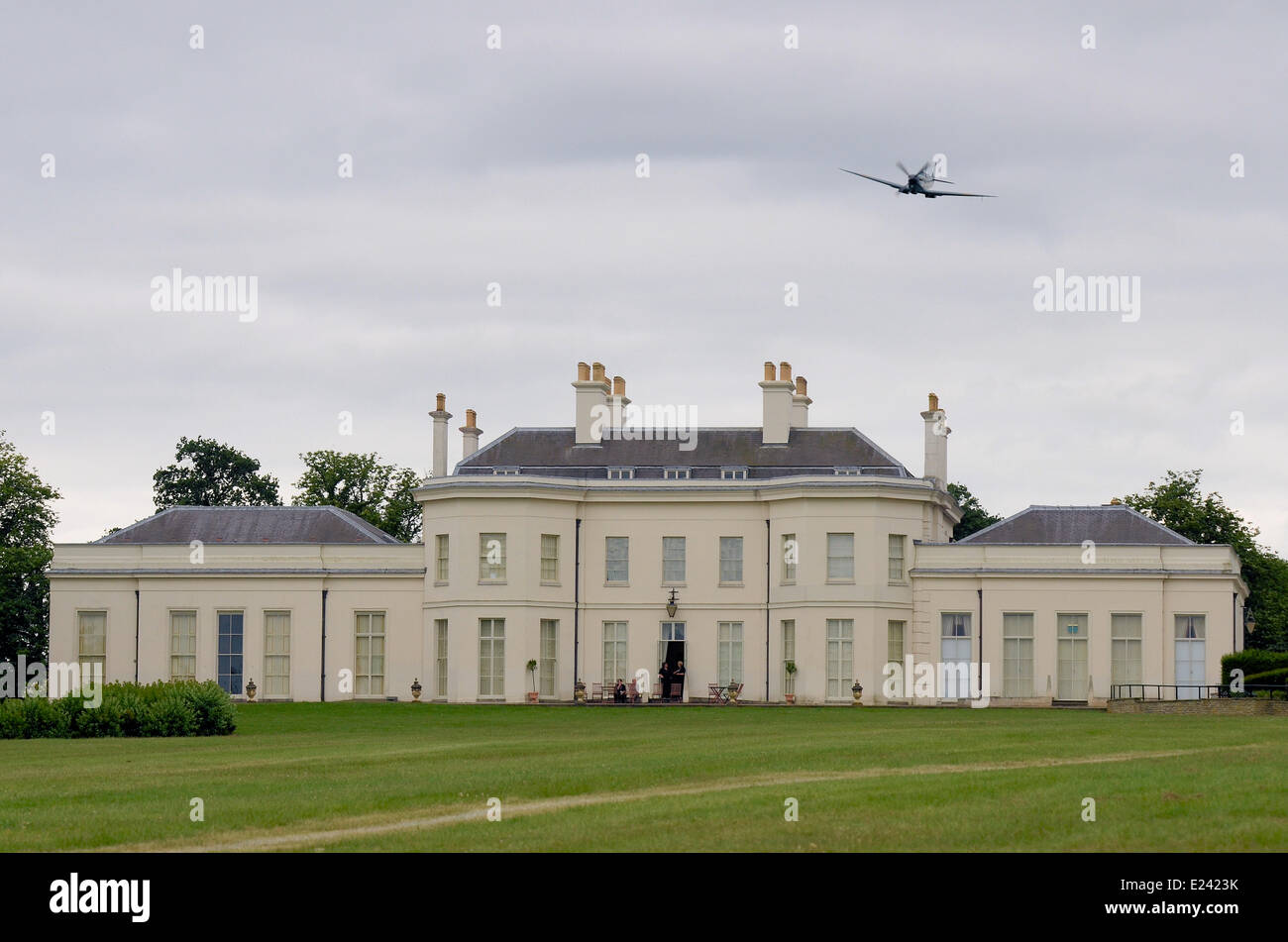 Spitfire flying over Hylands House at Boys Toys event at Hylands Park ...
