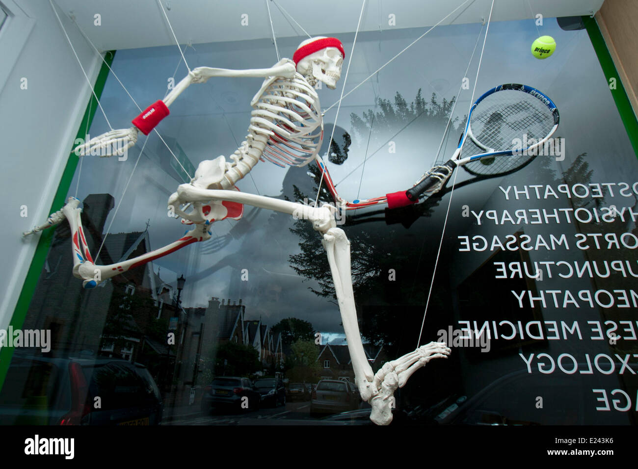 Skeleton with tennis racket hi-res stock photography and images - Alamy