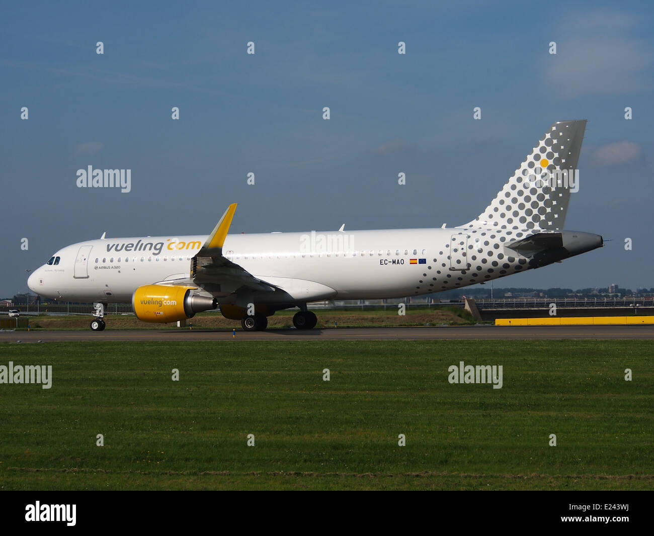 EC-MAO is a Vueling Airlines Airbus A320, taxiing at Schiphol Airport ...