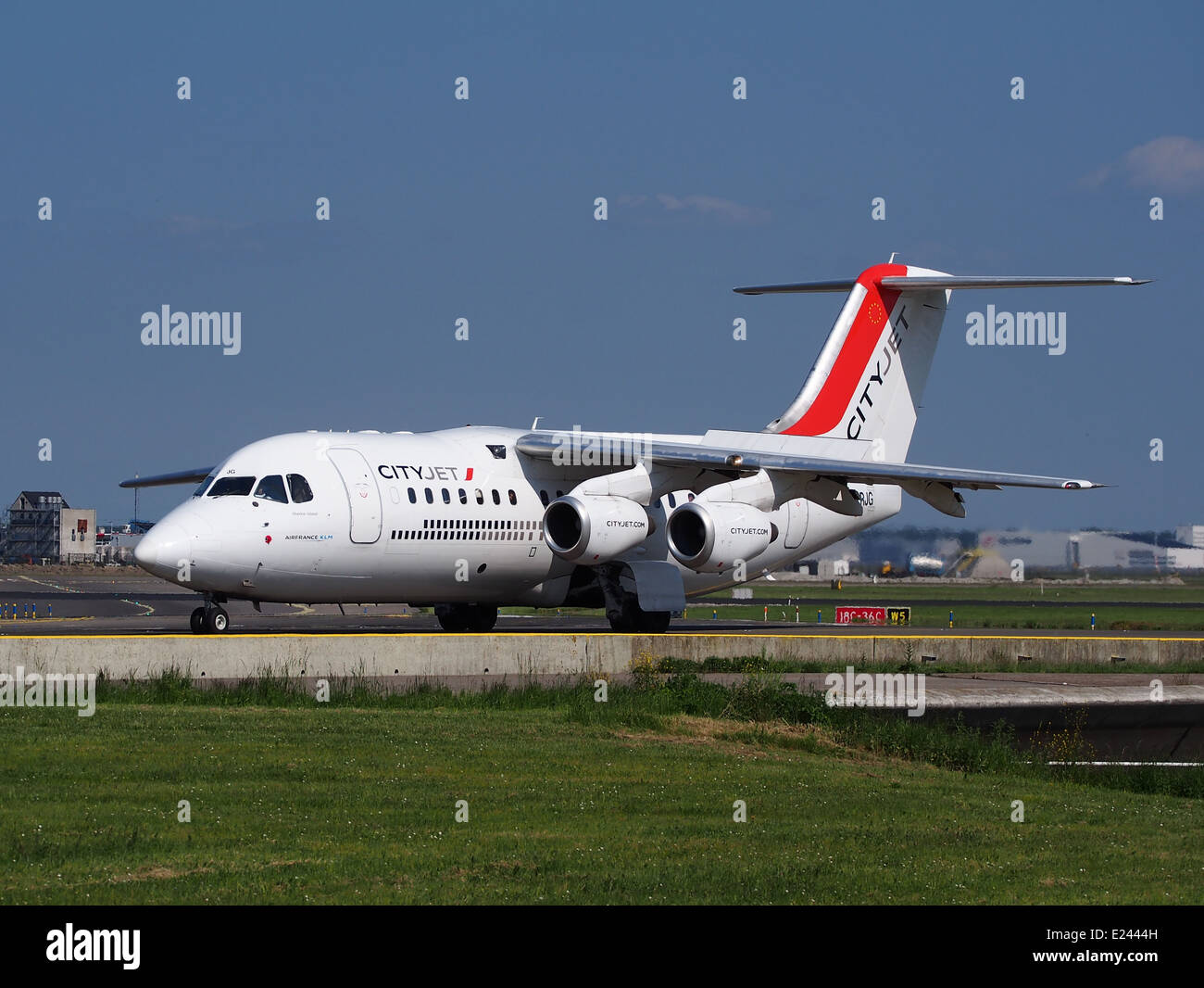 EI-RJG, a CityJet AVRO RJ 85, is taxiing on the runway at Schiphol ...