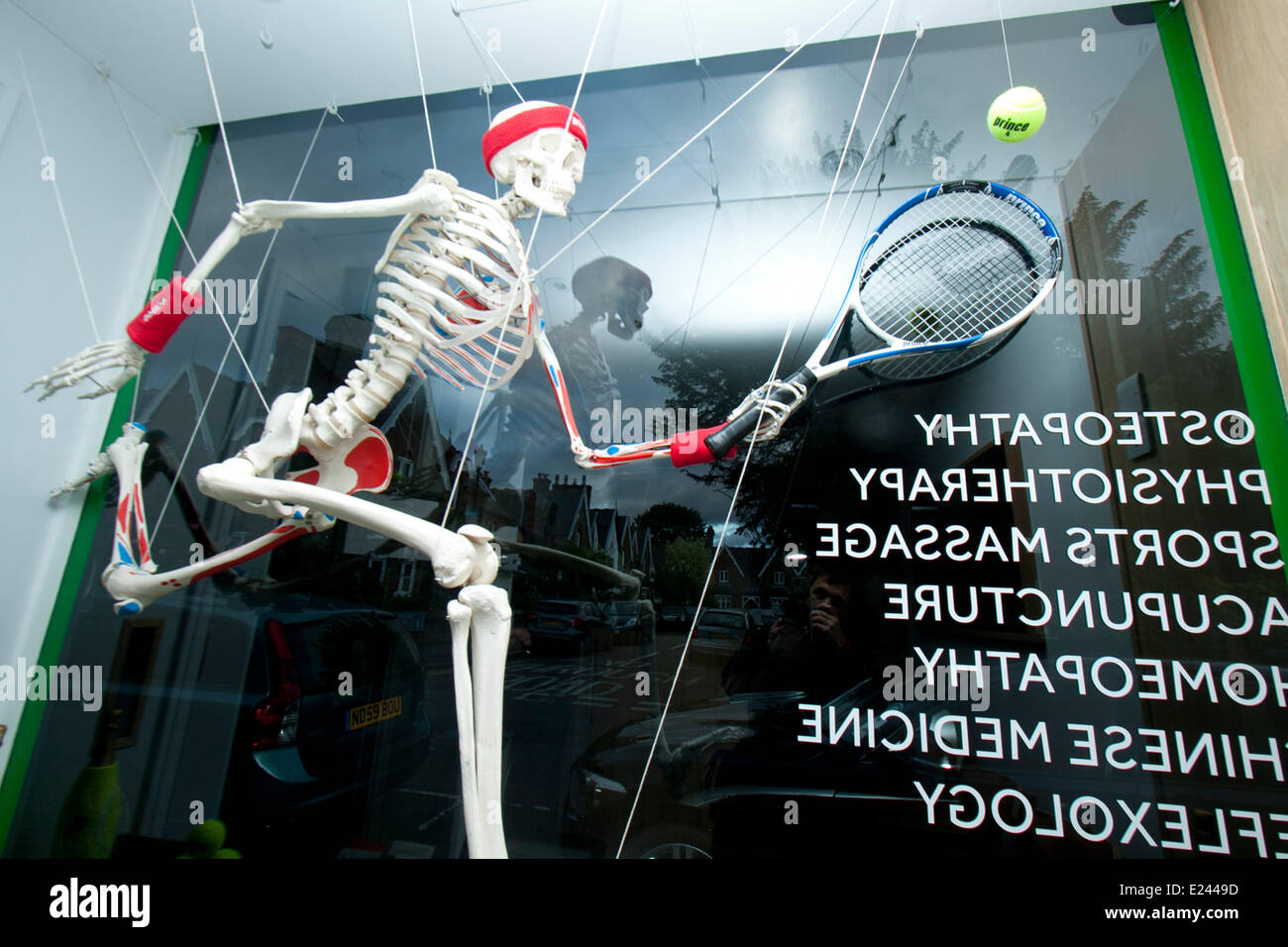 Wimbledon London, UK. 15th June 2014 A human skeleton holding a tennis ...