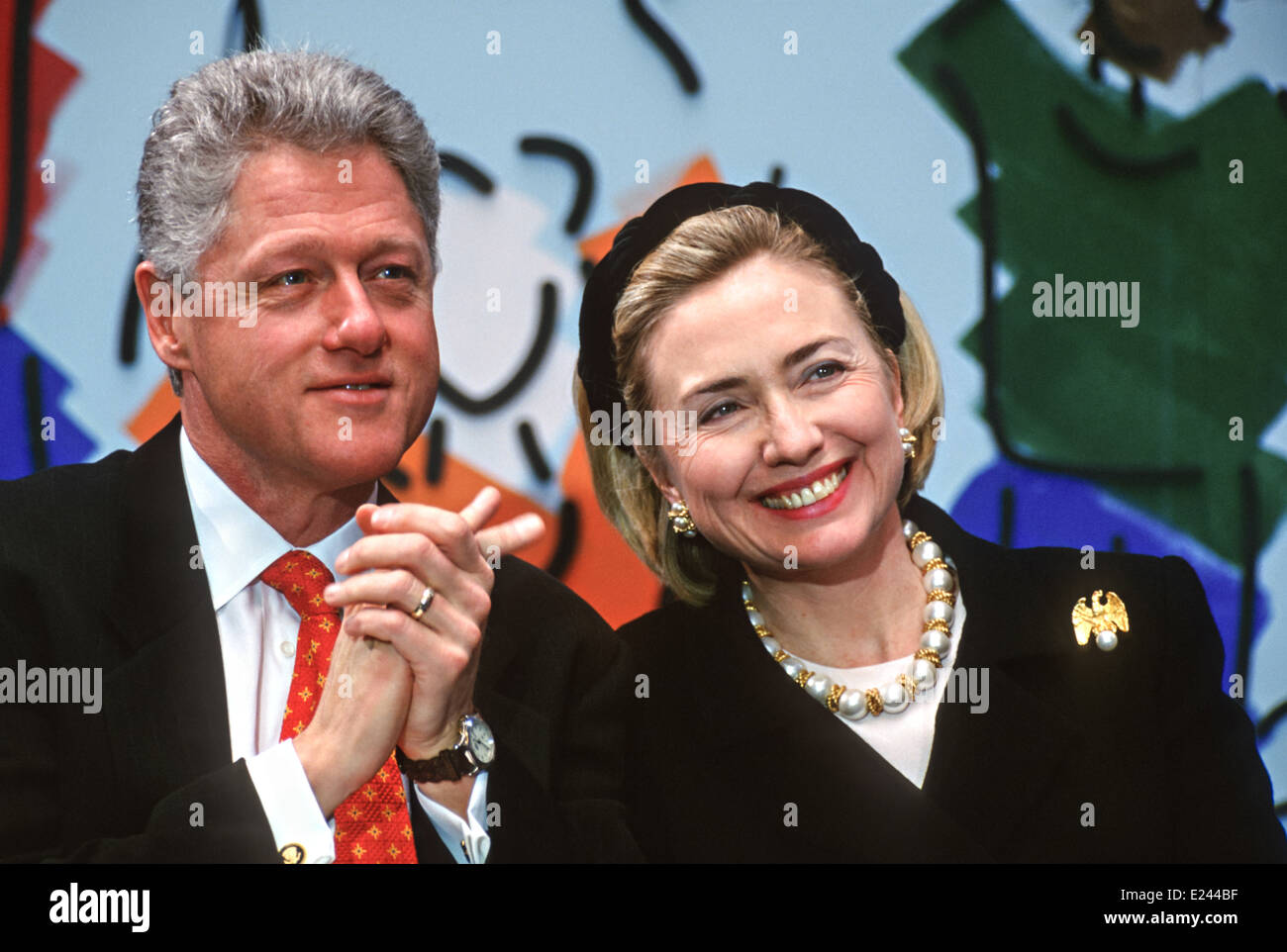 US President Bill Clinton talks with first lady Hillary Clinton during ...