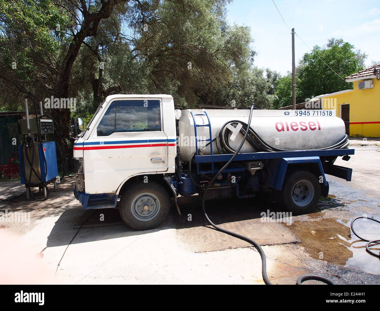A fuel bowser manufactured by Mazda is shown, likely used for refueling ...