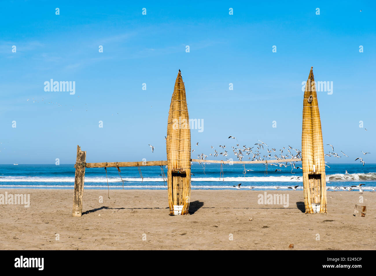 Traditional Peruvian small Reed Boats Stock Photo - Alamy