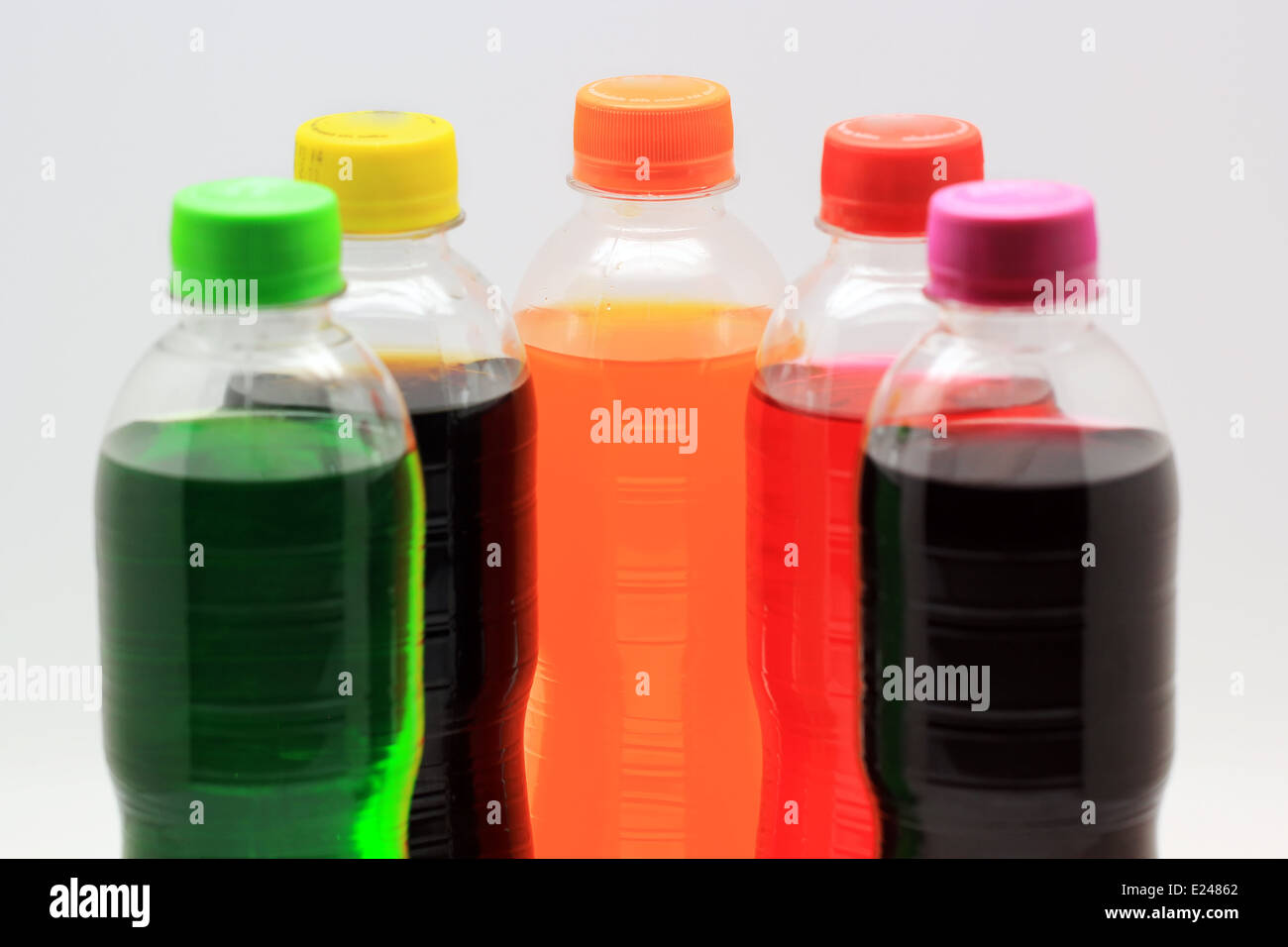 colorful of soft drink bottles on isolated background Stock Photo - Alamy