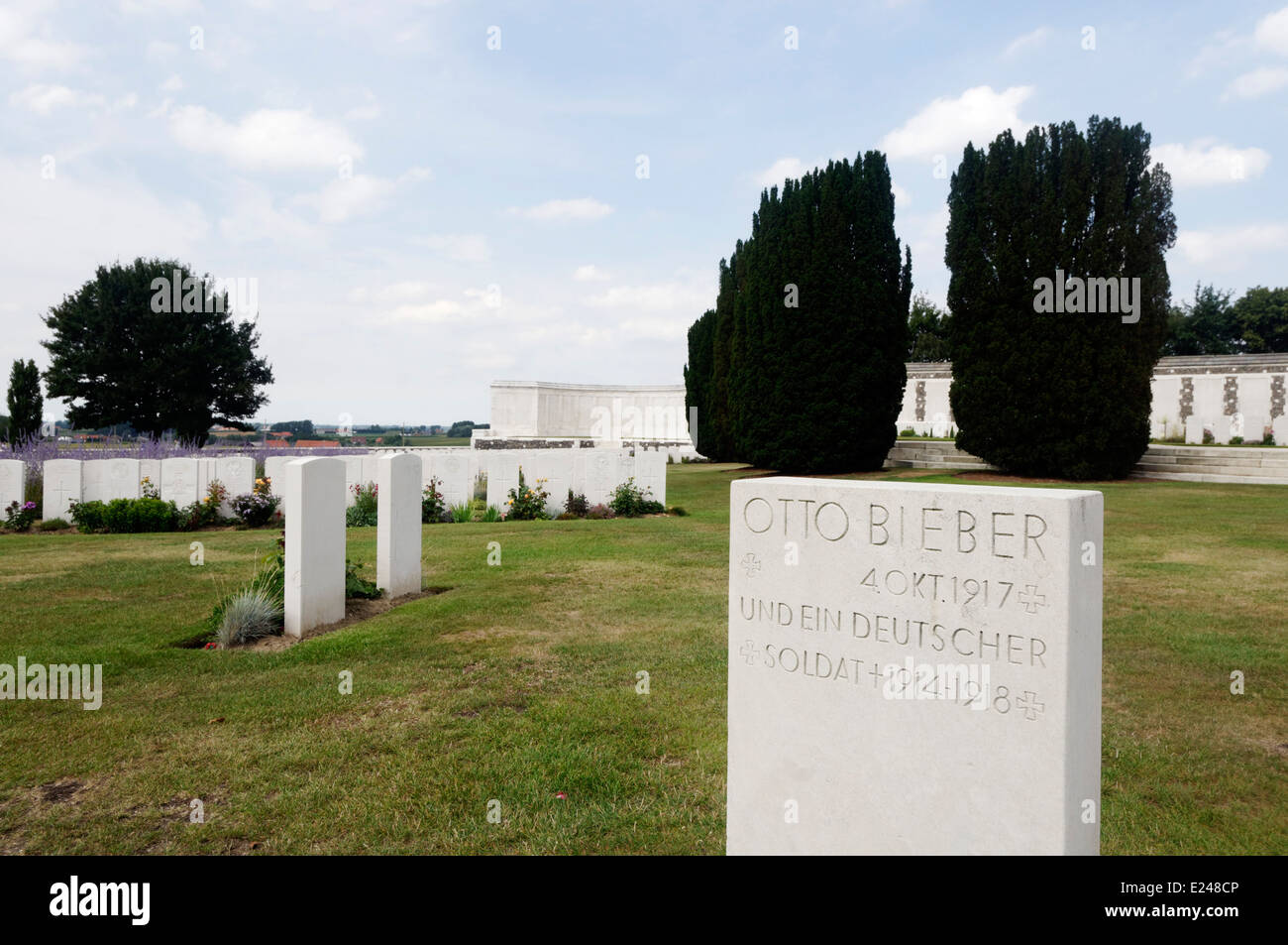 A German soldier's grave at Tyne Cot Cemetery near Ypres in Belgium ...