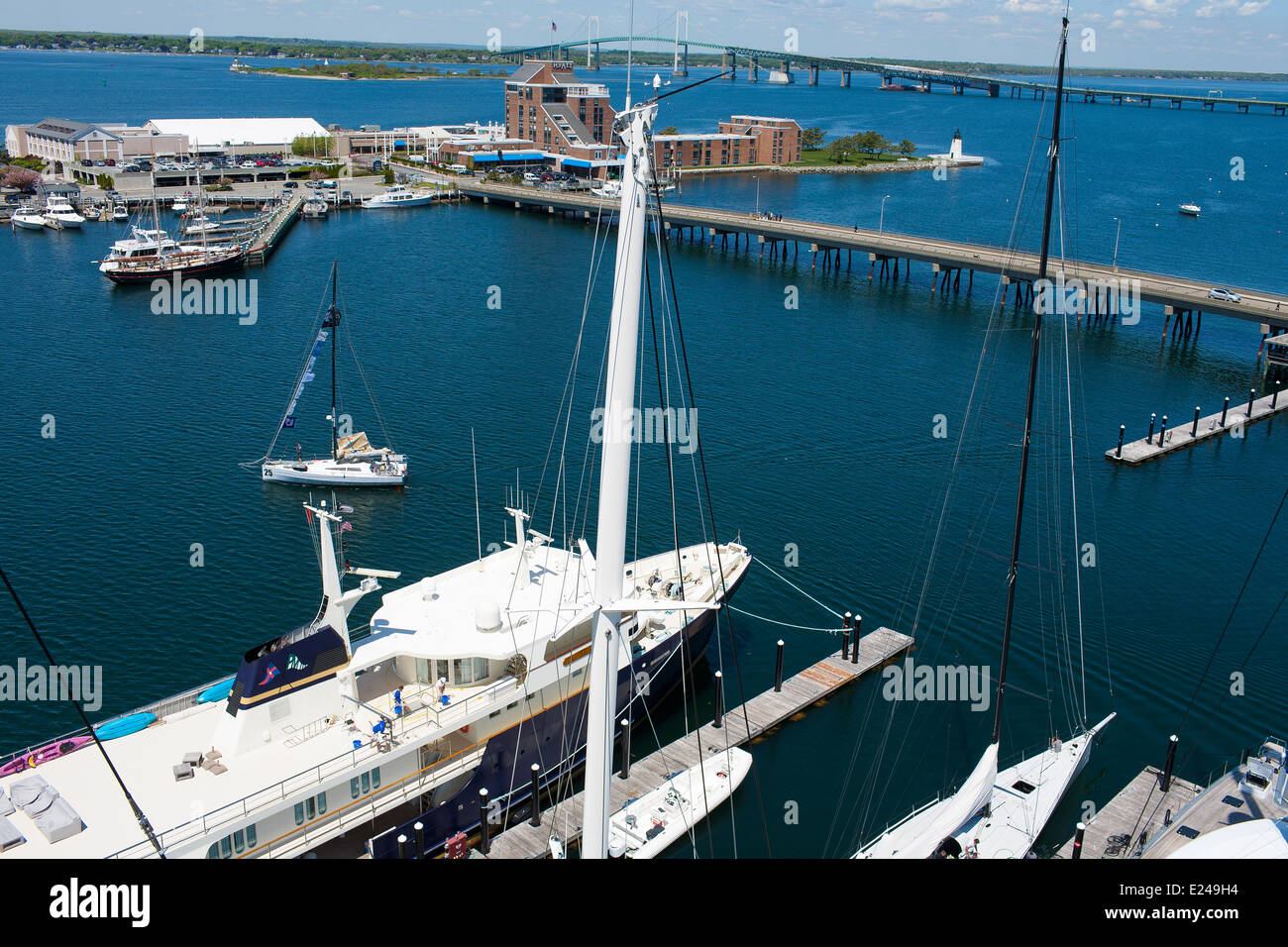 An aerial view of Goat Island and luxury megayachts docked at the Newport shipyard facility for ...