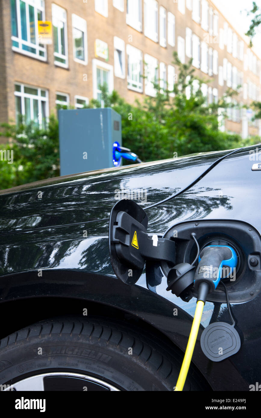 electric car loading energy at a public charging system in the Hague ...