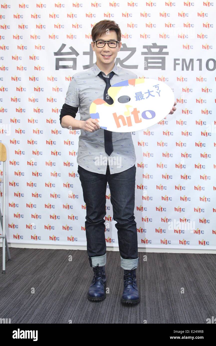 Taipei, China. 12th June, 2014. Singer Victor Wong promotes his new ...