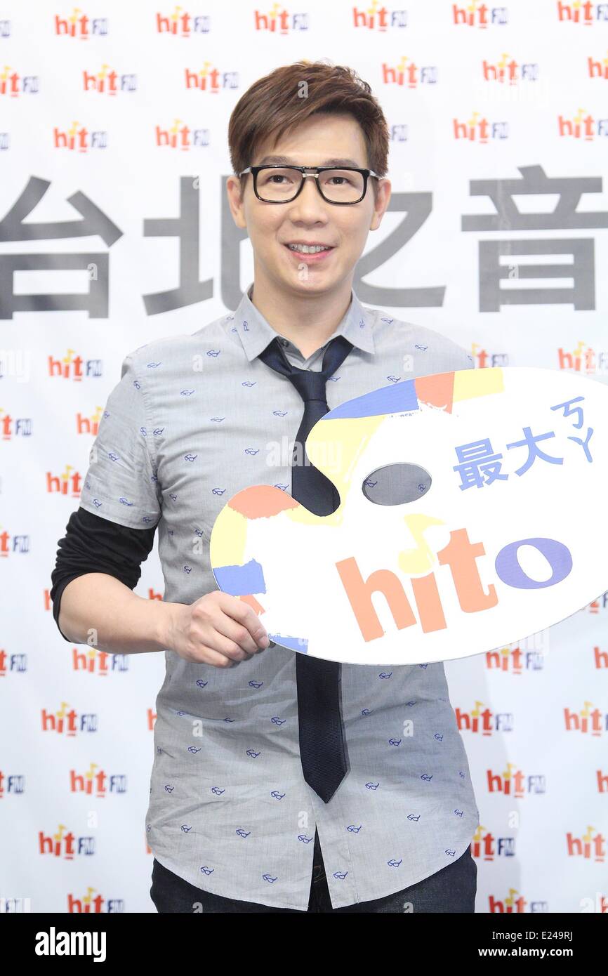 Taipei, China. 12th June, 2014. Singer Victor Wong promotes his new ...