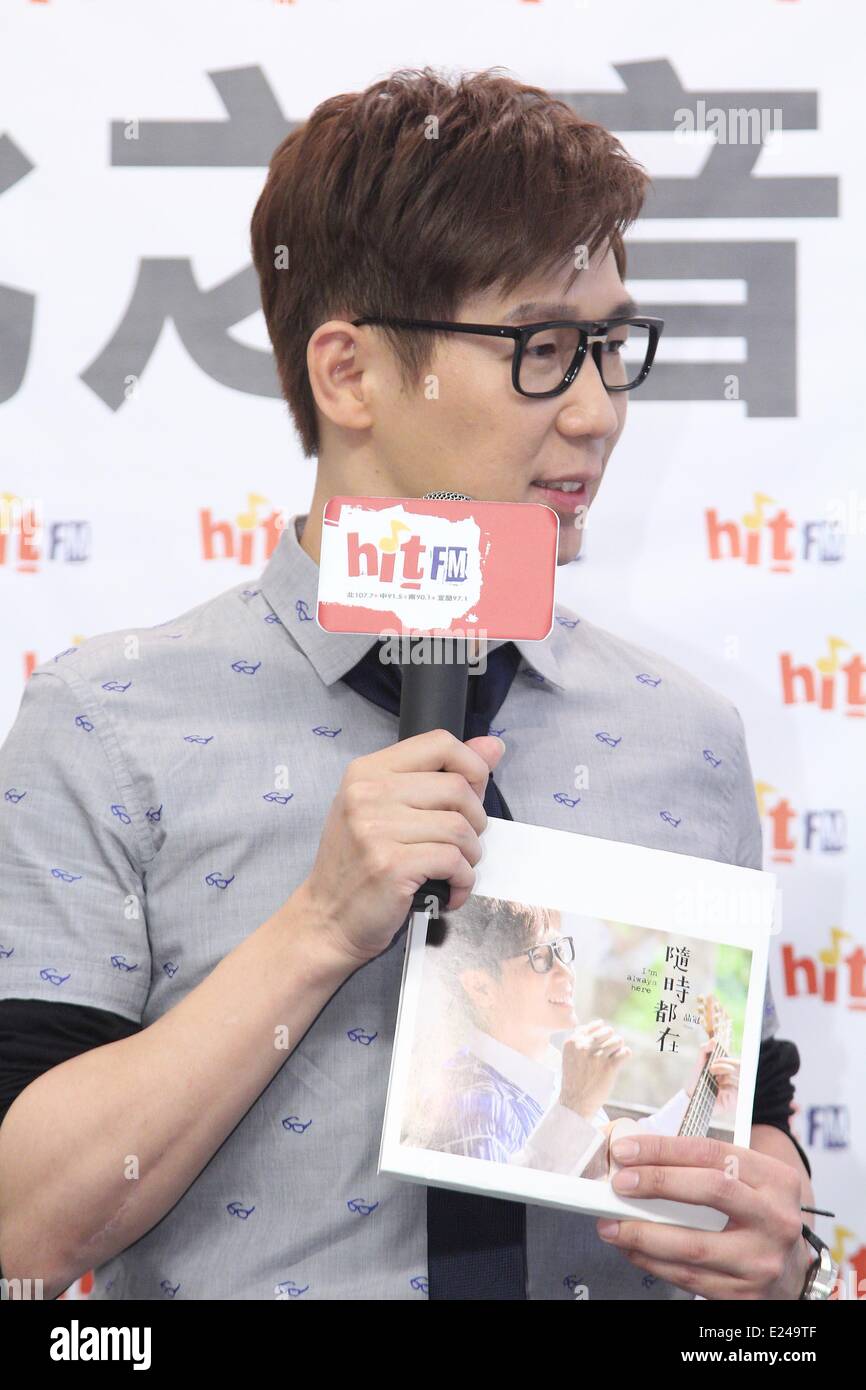Taipei, China. 12th June, 2014. Singer Victor Wong promotes his new ...