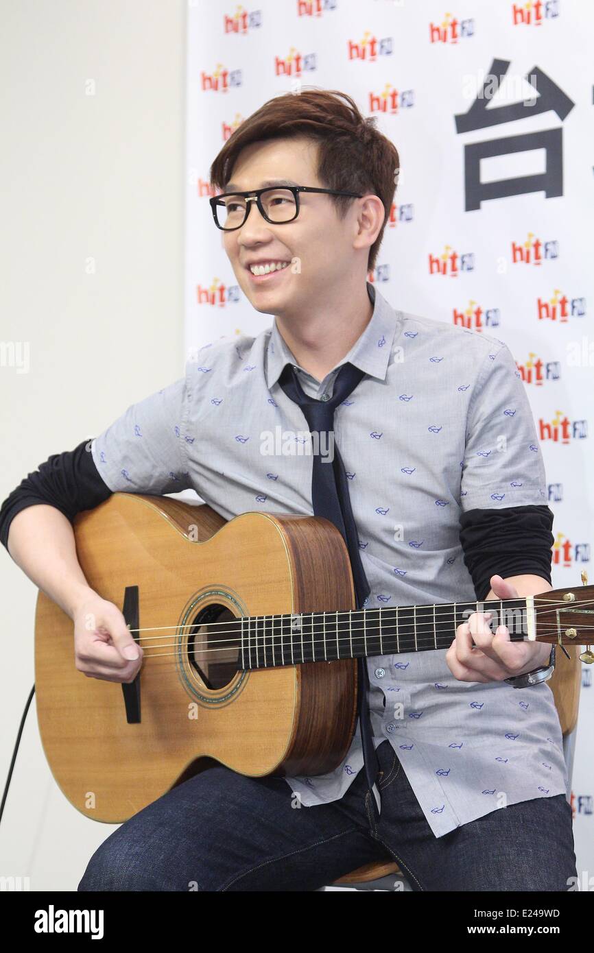 Taipei, China. 12th June, 2014. Singer Victor Wong promotes his new ...