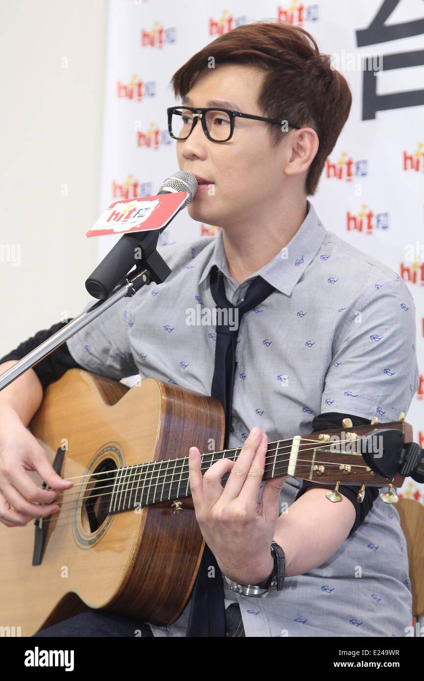 Taipei, China. 12th June, 2014. Singer Victor Wong promotes his new ...