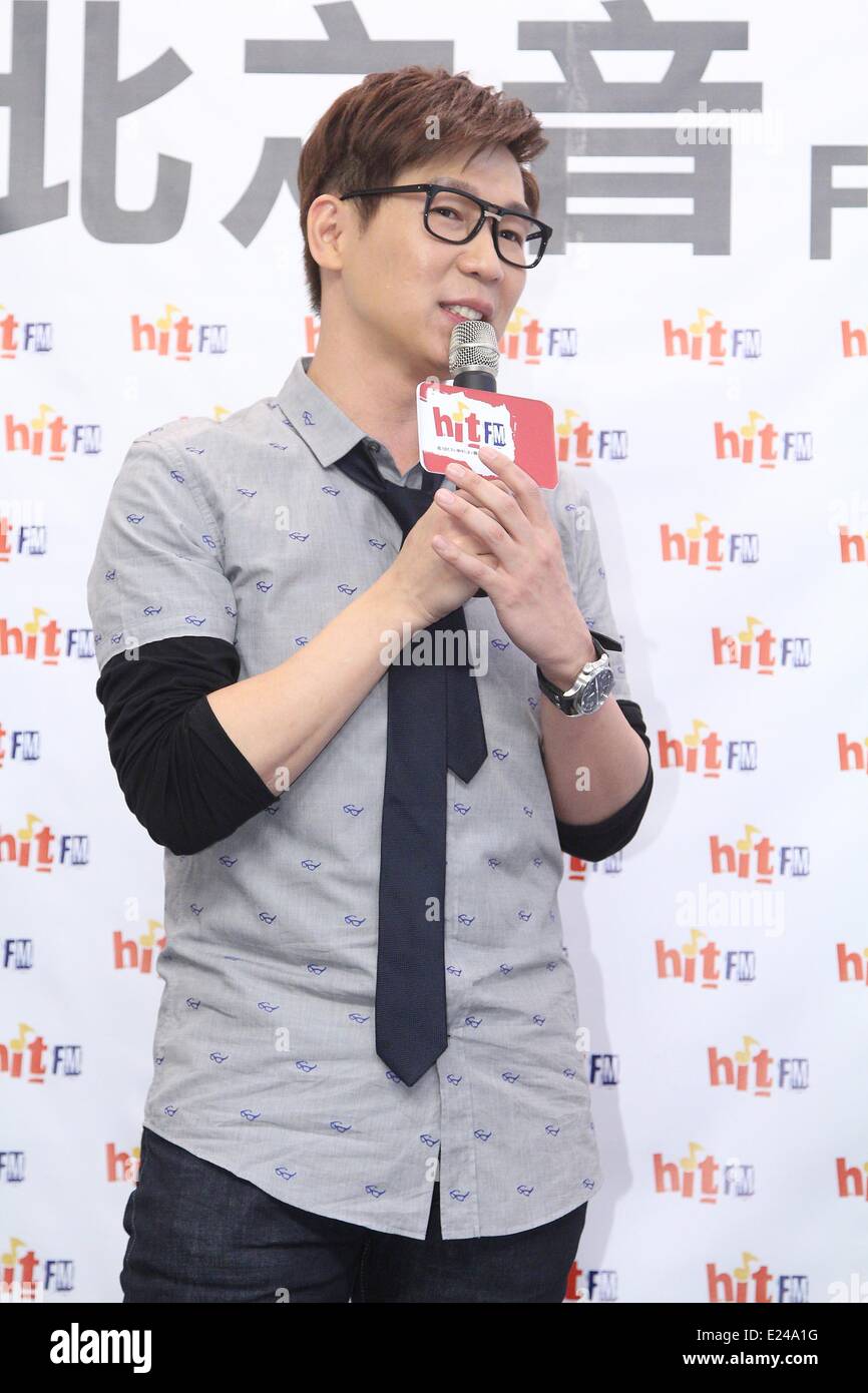 Taipei, China. 12th June, 2014. Singer Victor Wong promotes his new ...