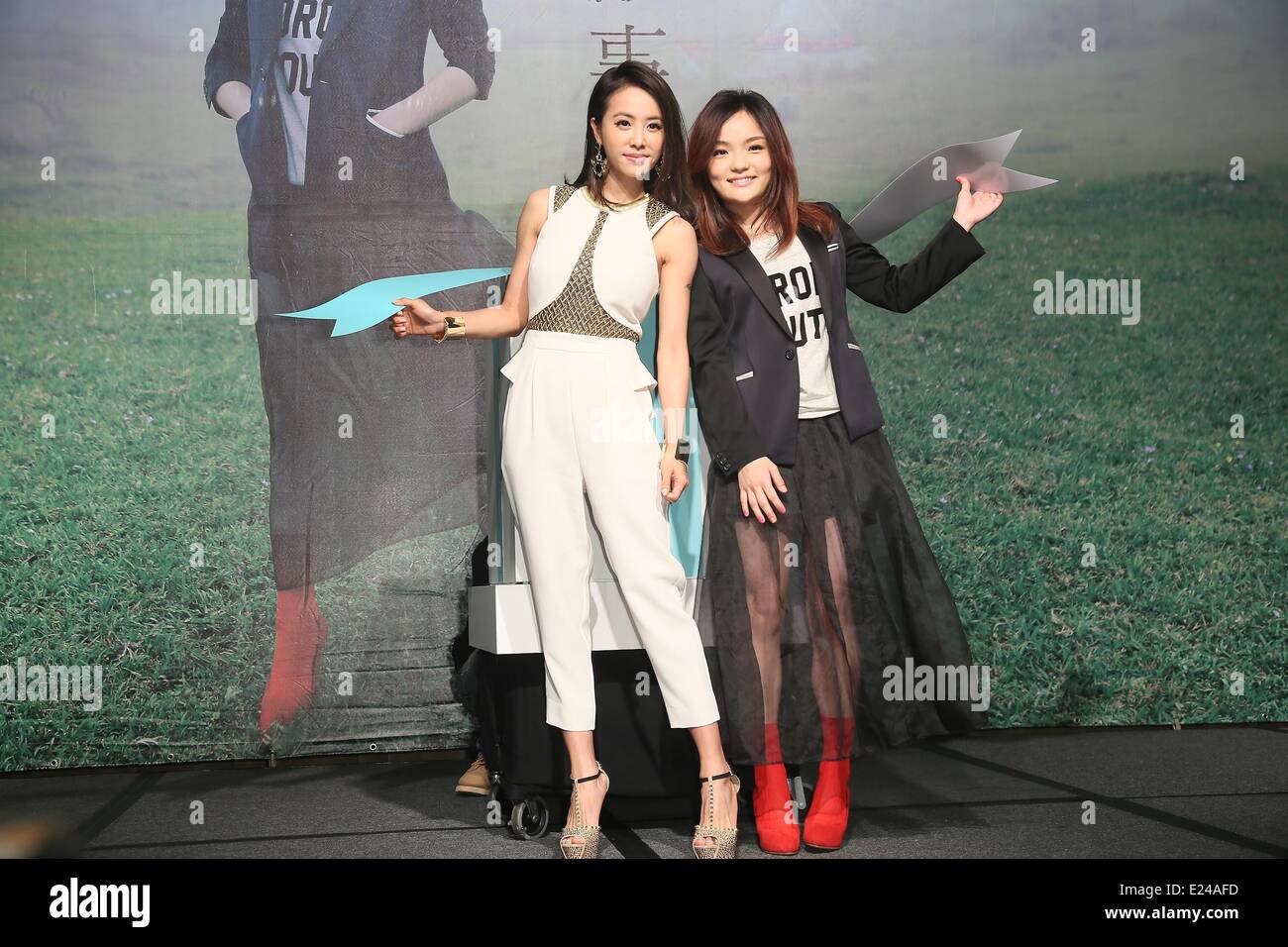 Taipei, China. 12th June, 2014. Singer Jolin Tsai (L) and Lala Hsu ...