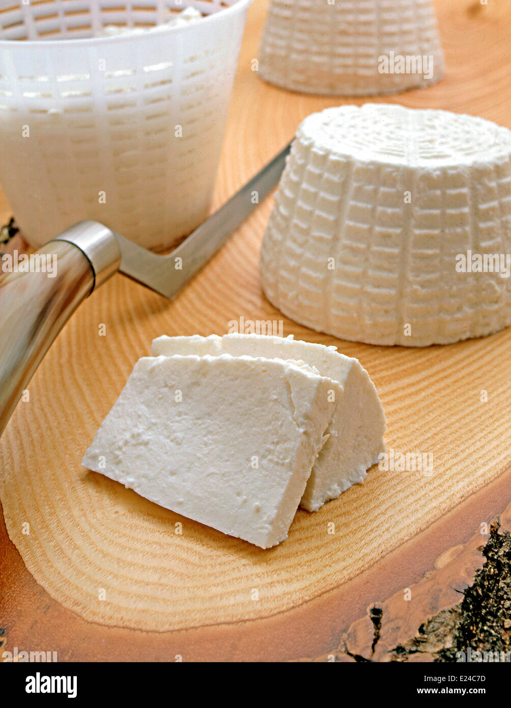 Sliced white Italian ricotta cheese Stock Photo - Alamy