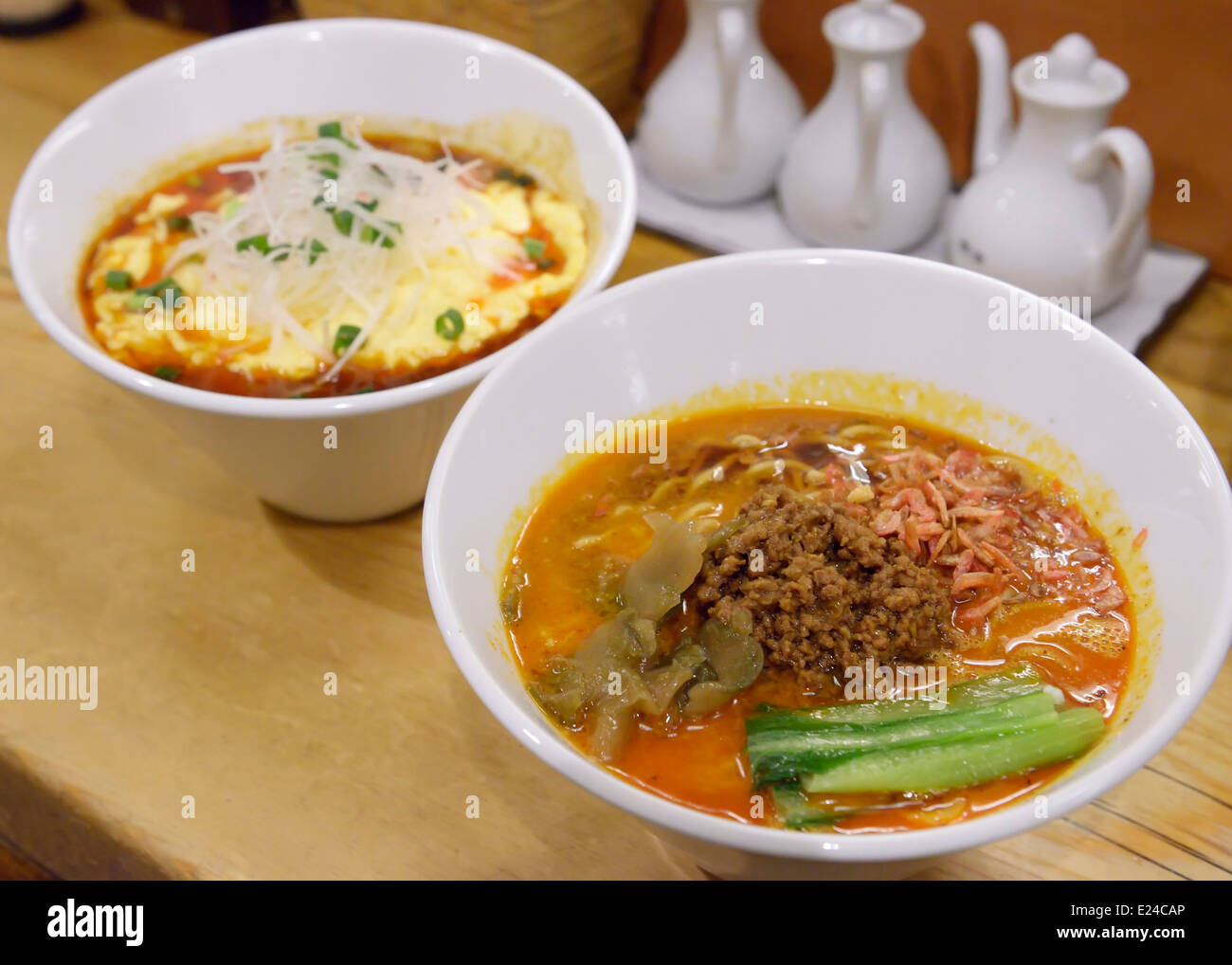 Two bowls of ramen on a restaurant table in Tokyo, Japan Stock Photo ...
