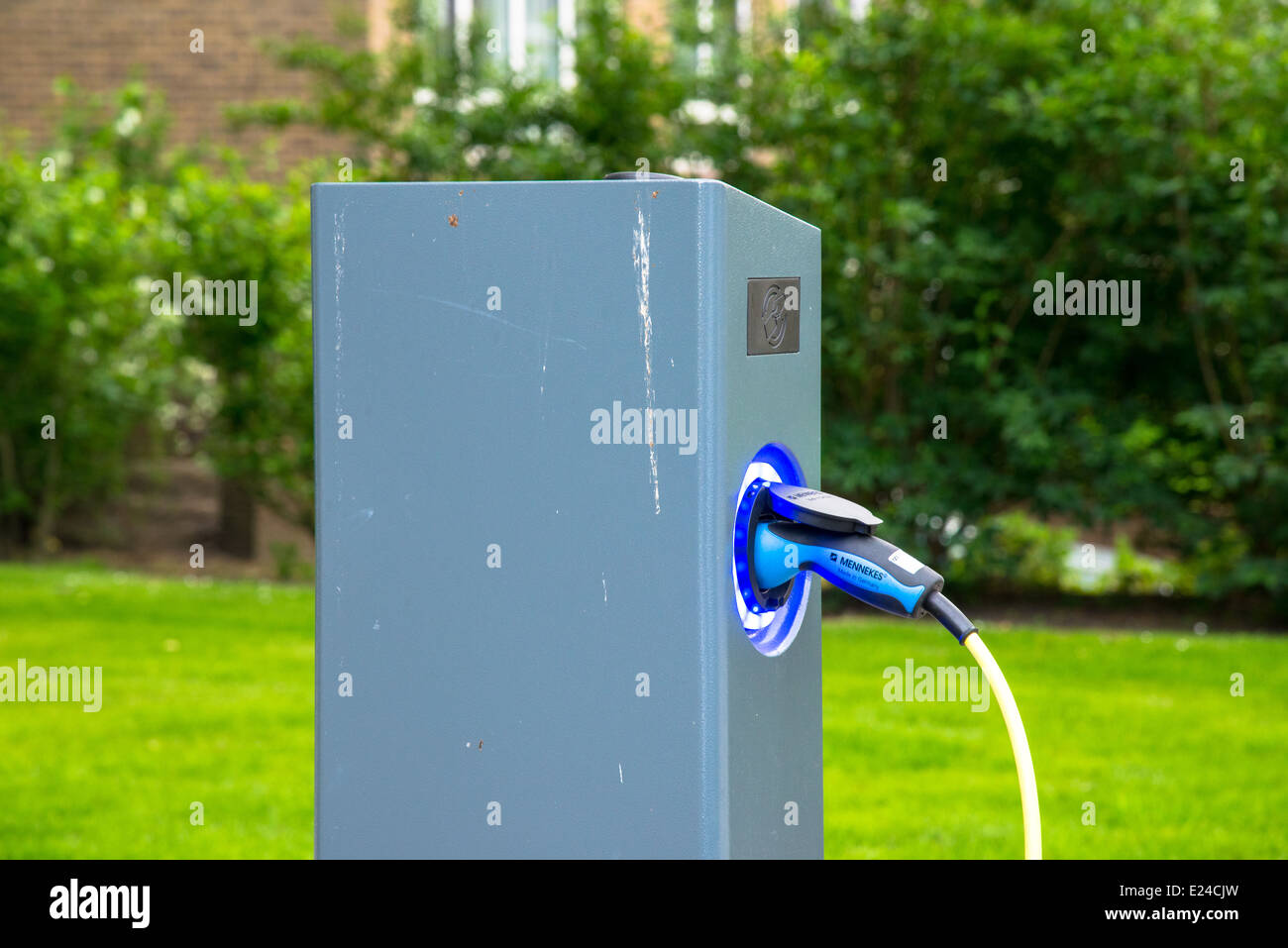 electric car loading energy at a public charging system in the Hague ...
