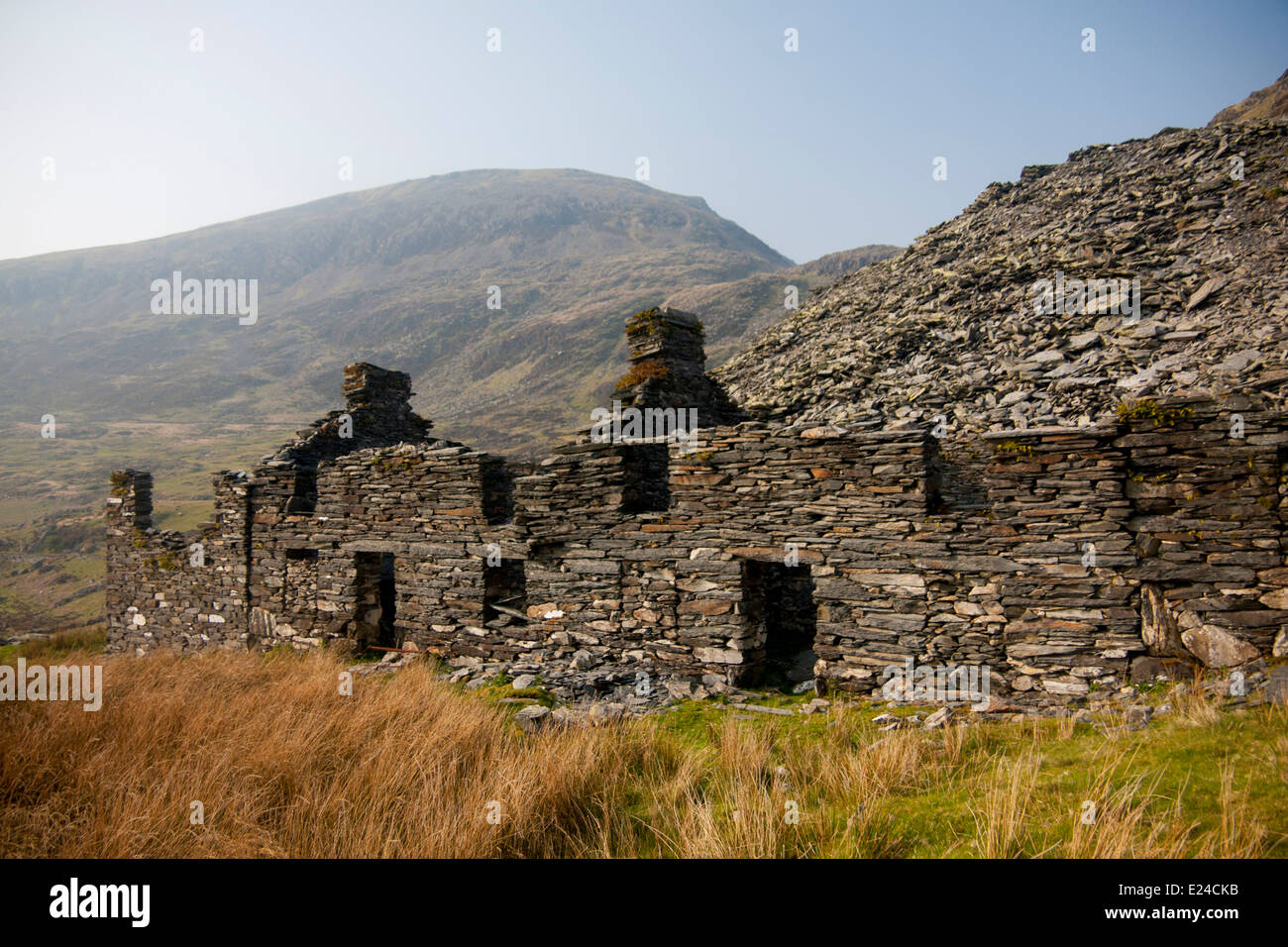 Gorseddau slate quarry Ruins of cottages buildings and slate spoil tip ...