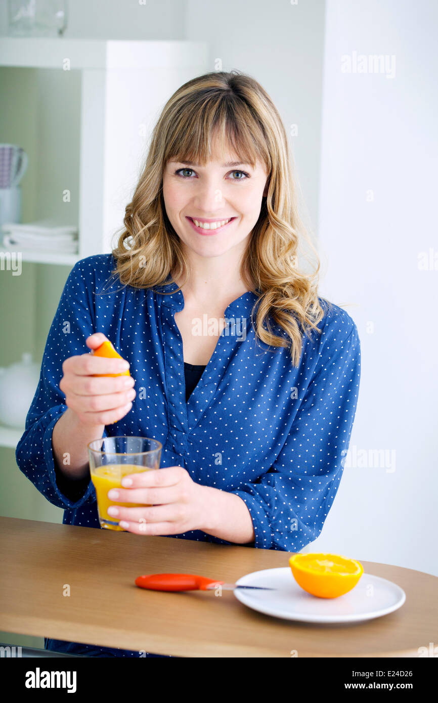 Woman with cold drink Stock Photo - Alamy