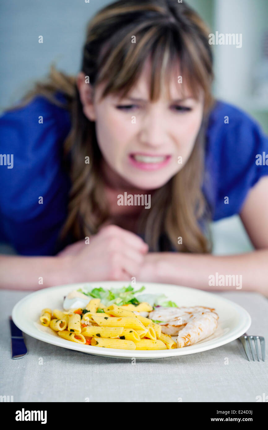 Woman with a meal Stock Photo - Alamy