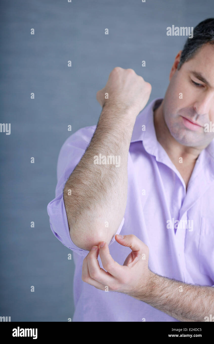 Man elbows male hi-res stock photography and images - Alamy