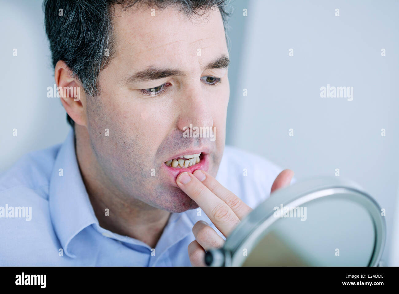 Man with mirror Stock Photo - Alamy