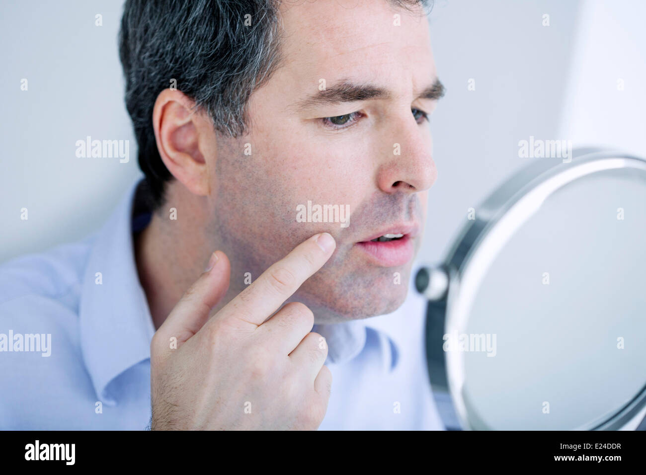 Man with mirror Stock Photo - Alamy