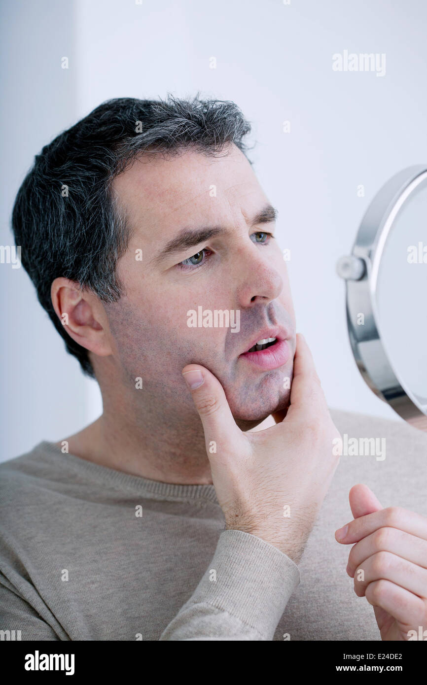 Man with mirror Stock Photo - Alamy