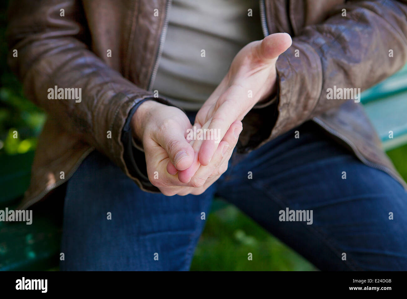Man with painful hand Stock Photo - Alamy