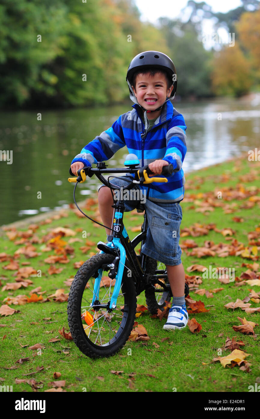 Boys ride bikes hi-res stock photography and images - Alamy
