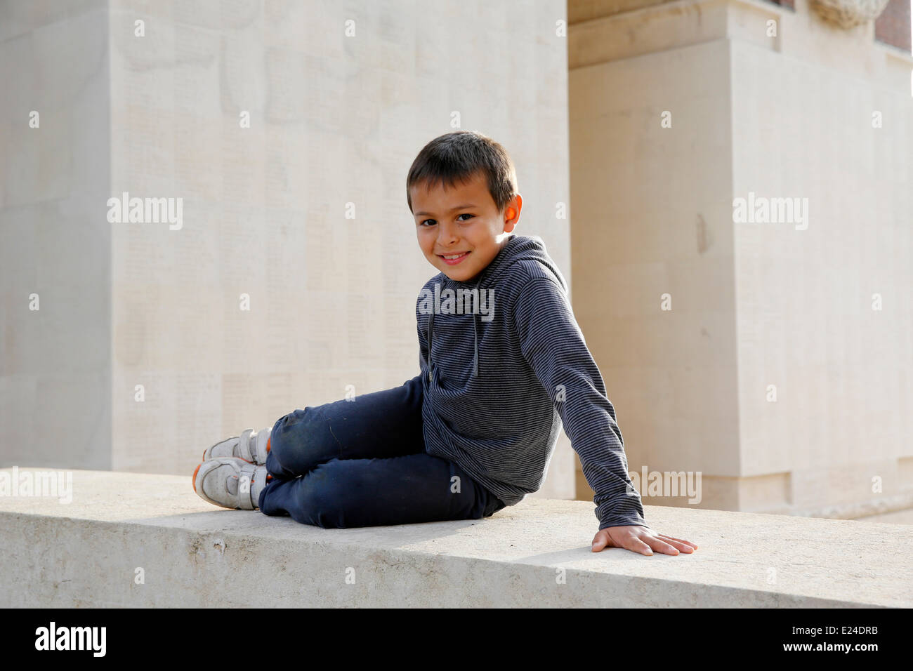 Boy sitting seated hi-res stock photography and images - Alamy