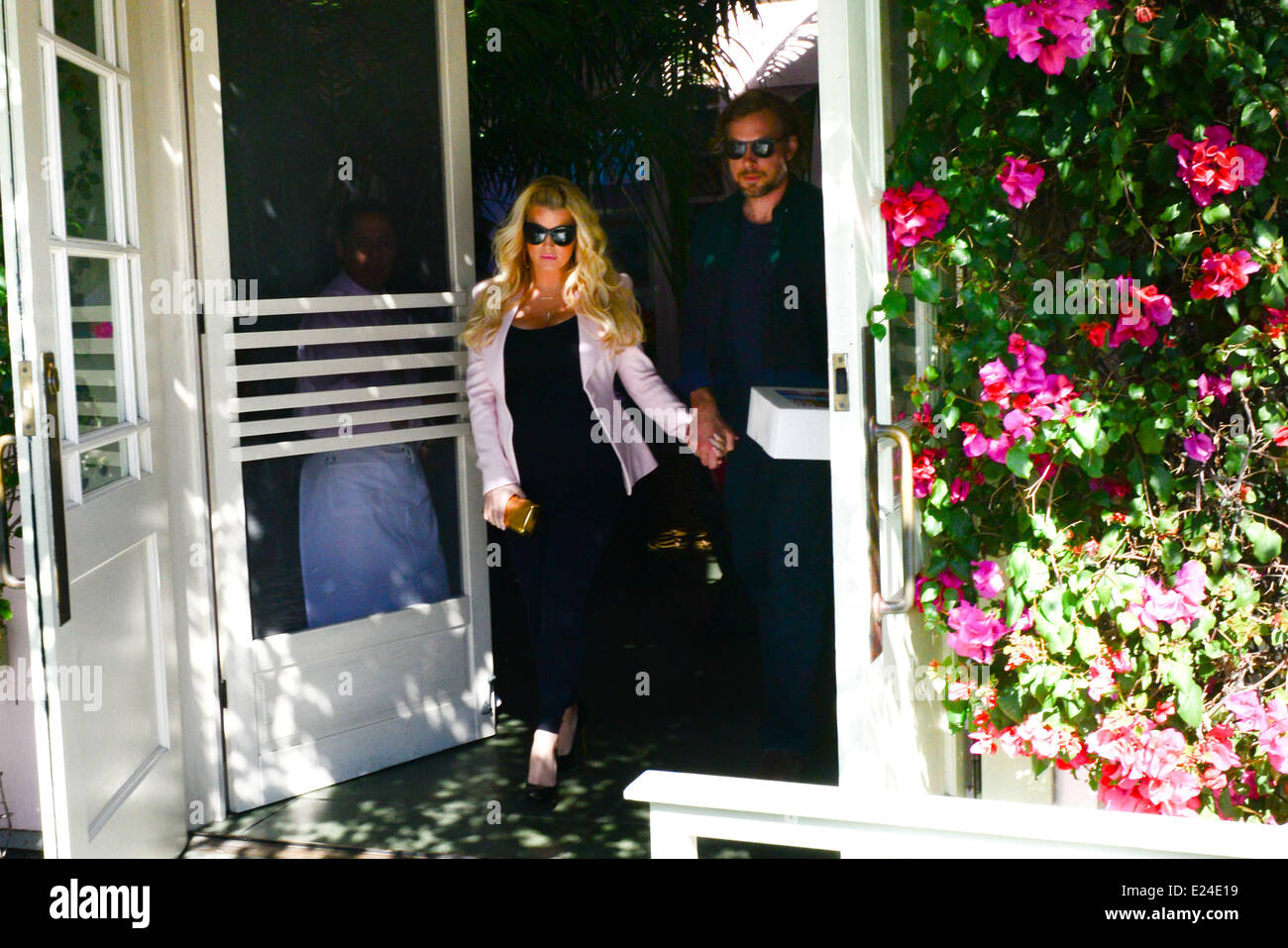 Jessica Simpson and Eric Johnson leaving a restaurant hand in hand ...