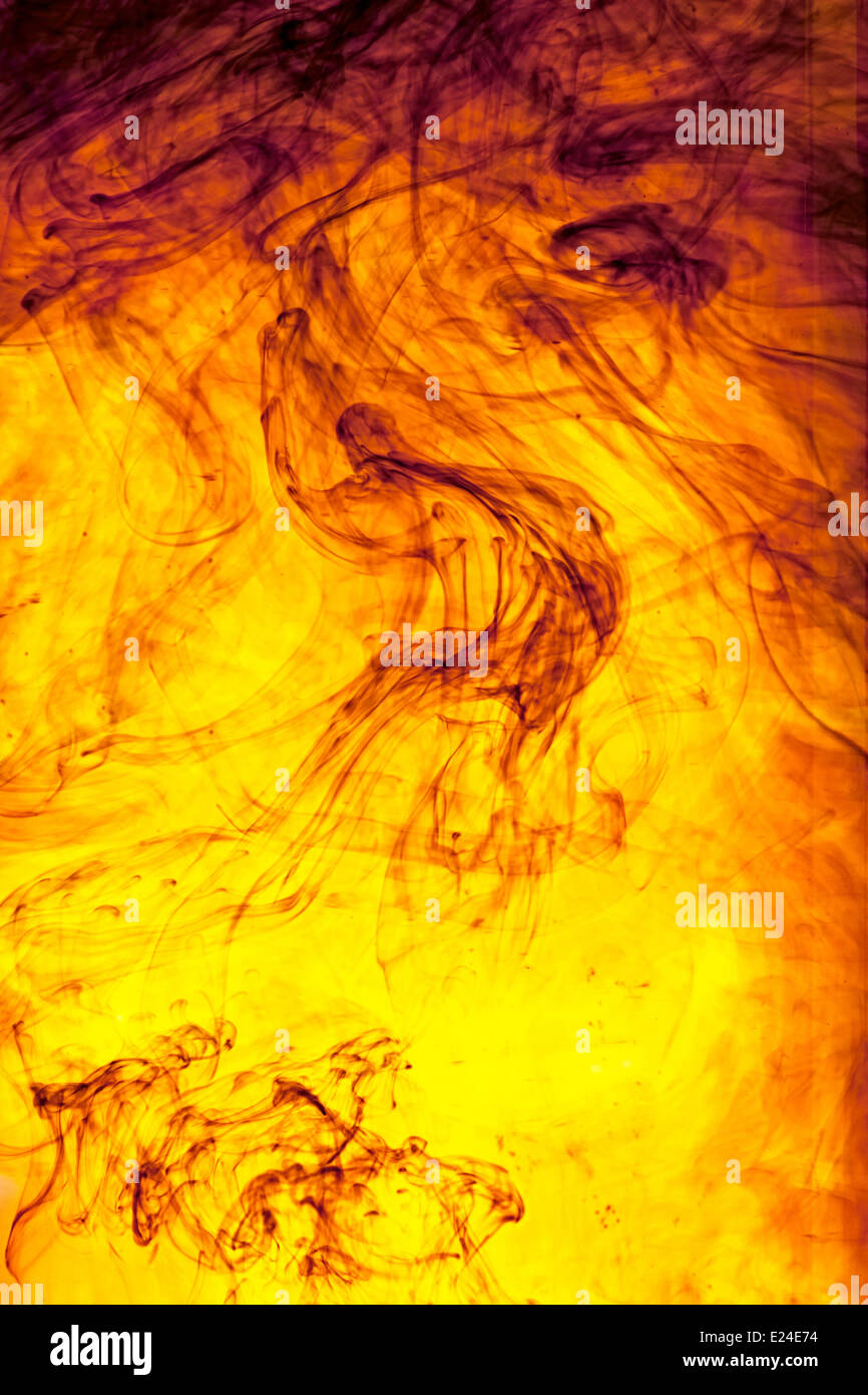 Swirling colorful tendrils of ink in water Stock Photo - Alamy