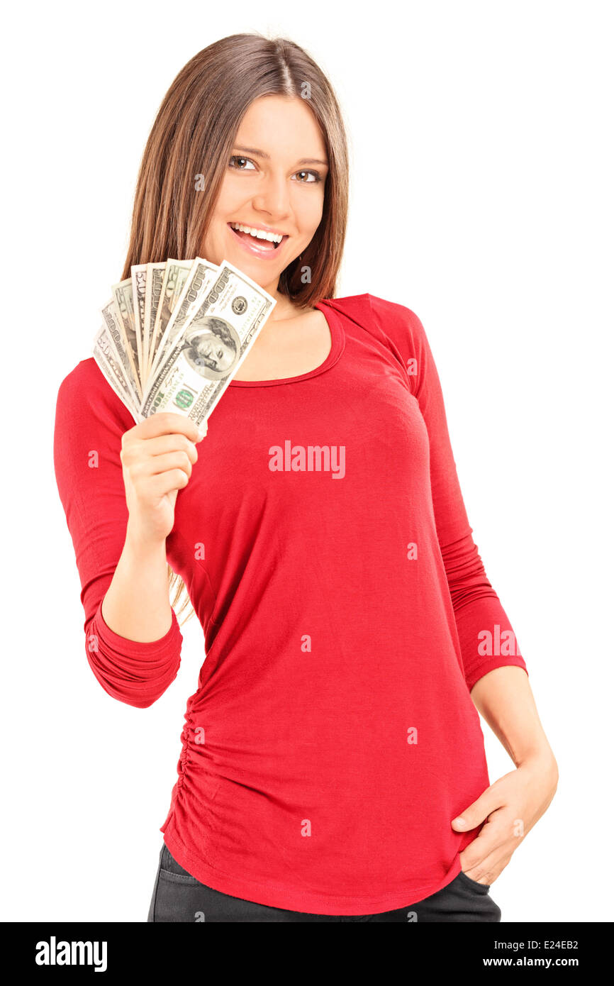 Beautiful young woman holding money Stock Photo - Alamy