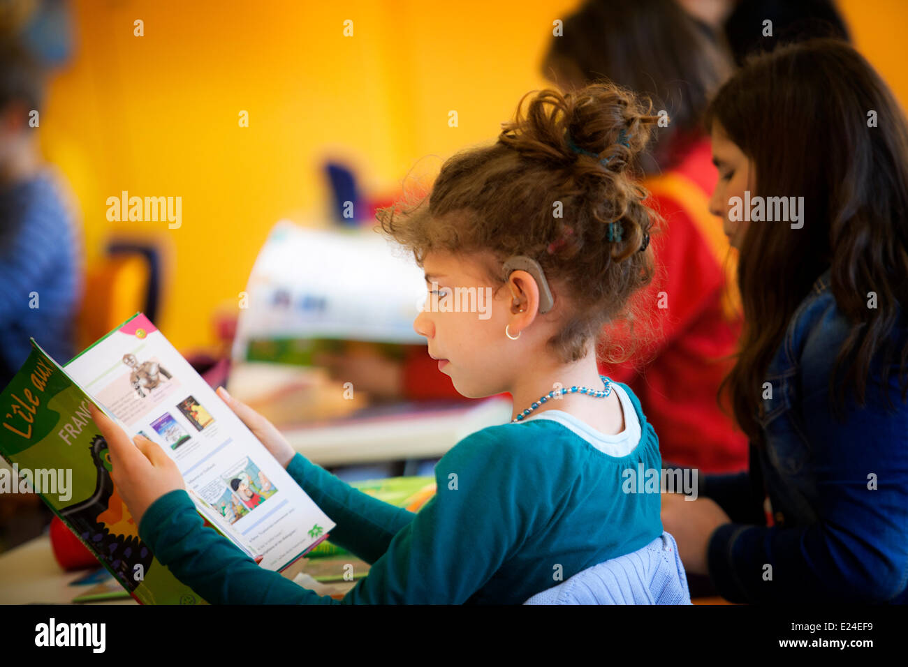 Disabled child reading hi-res stock photography and images - Alamy