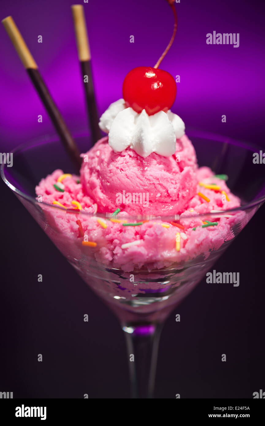 Raspberry ice cream in a Martini glass with with decoration Stock Photo ...