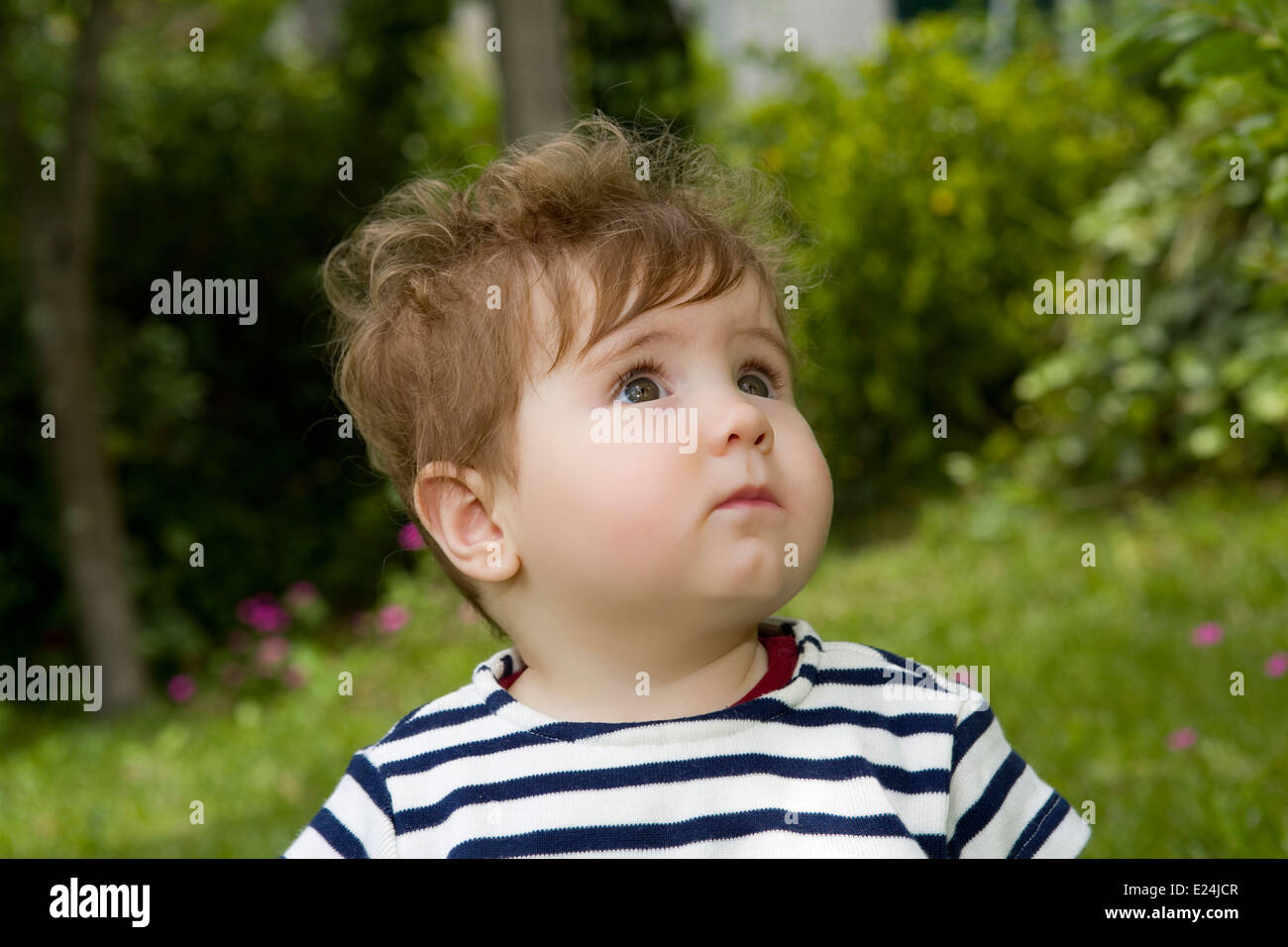 young baby girl at the garden Stock Photo - Alamy