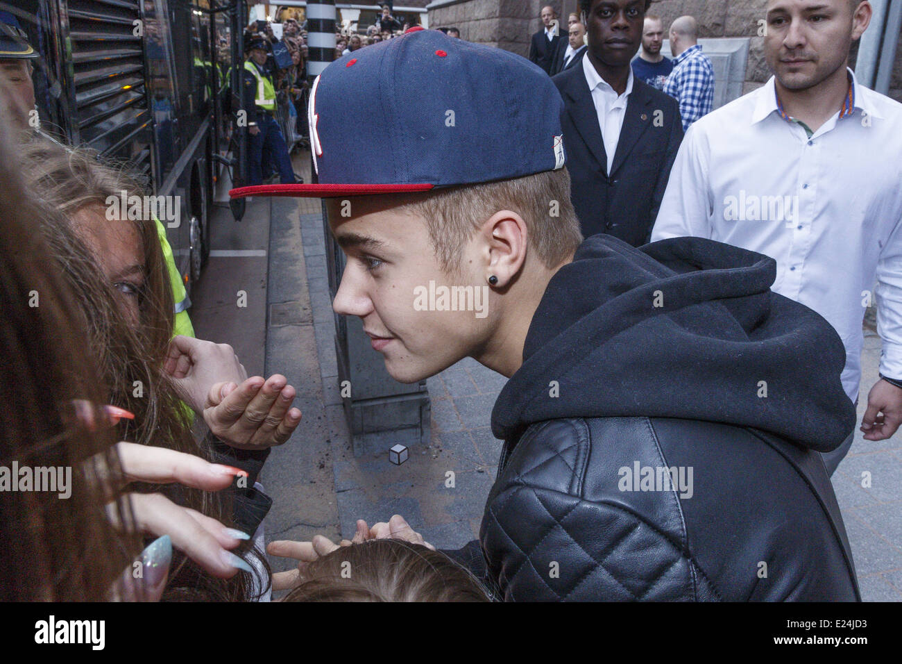 Justin Bieber talking with fans whilst leaving his hotel. Amsterdam ...
