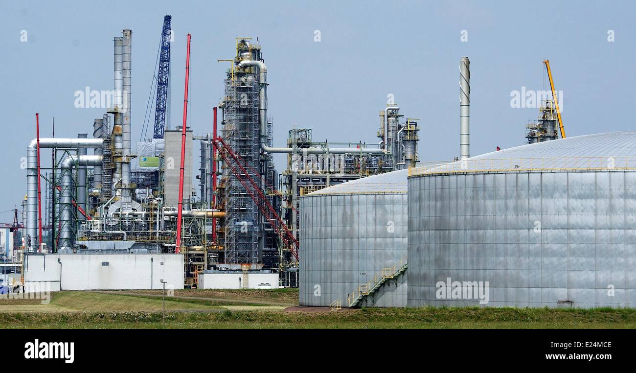 Cranes on the premises of the crude oil refinery of the French ...