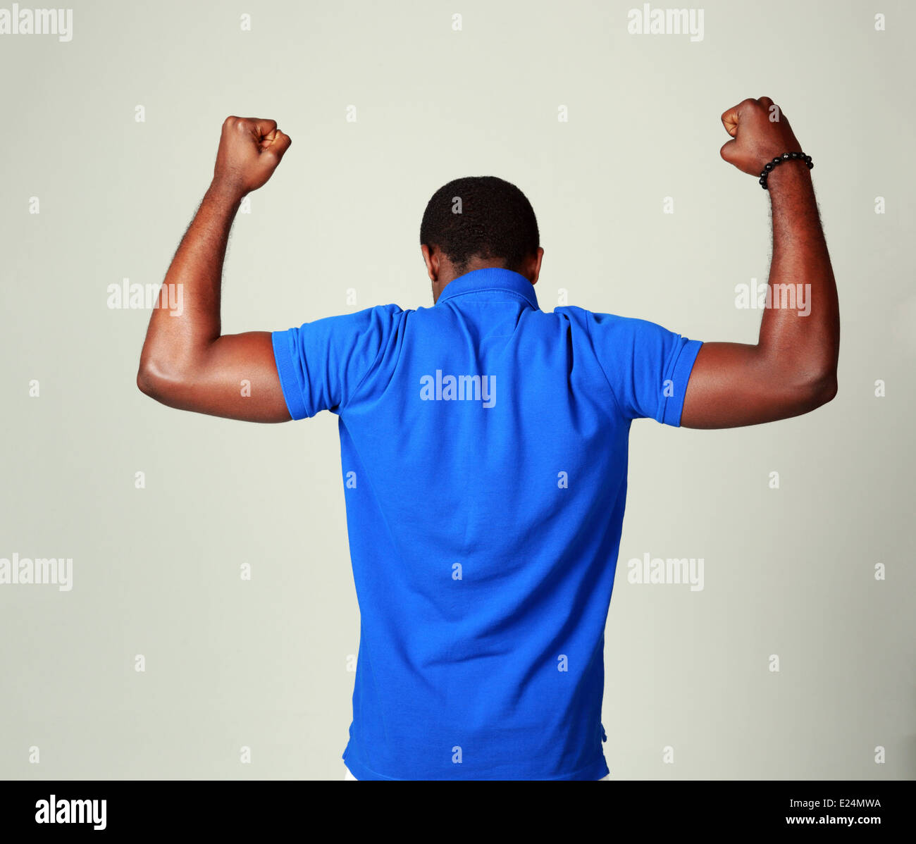 Back view portrait of african man on gray background Stock Photo - Alamy