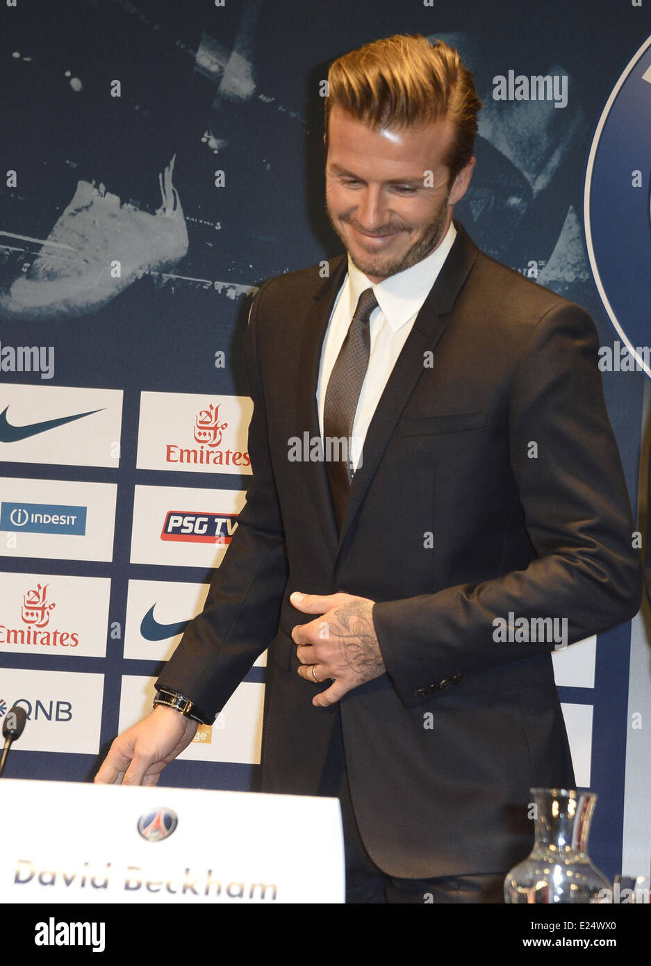 David Beckham attends a press conference after signing up for the ...